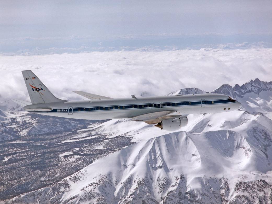 DC-8 Airborne Laboratory in Flight Over Sierra Nevada Mountain Range - NASA