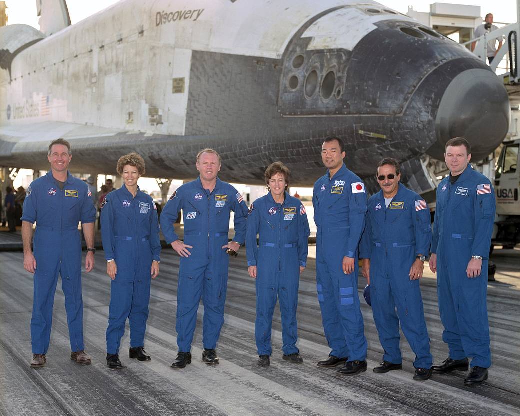 STS-114 Crew in Front of the Shuttle Discovery - NASA