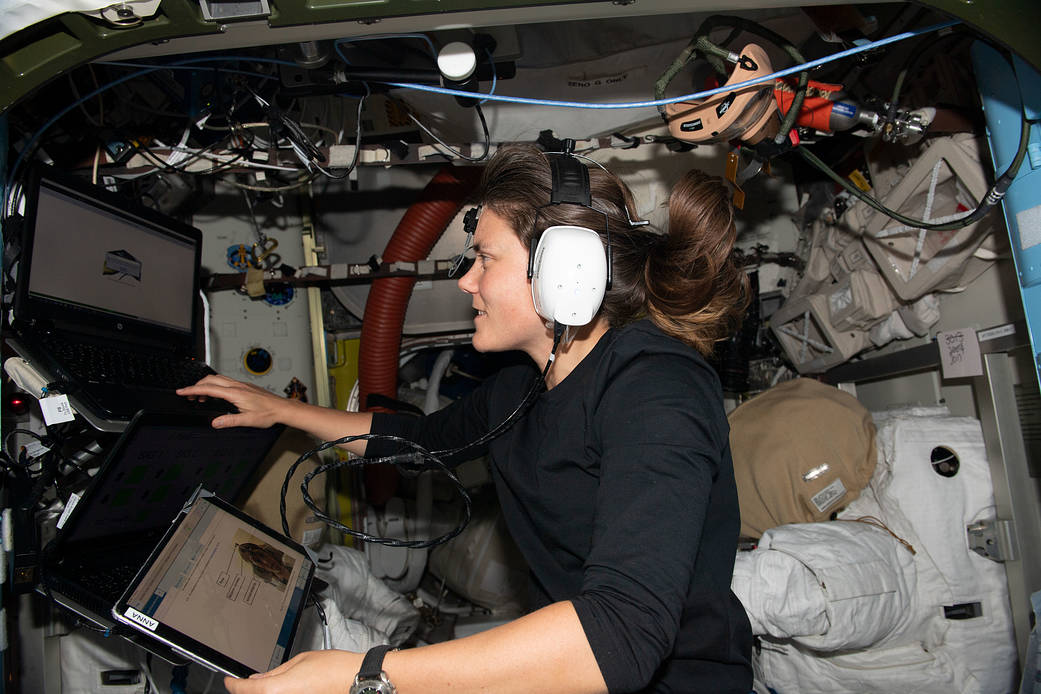 Cosmonaut Anna Kikina Wears Headphones For A Hearing Assessment NASA Cosmonaut Anna Kikina Wears Headphones For A Hearing Assessment NASA