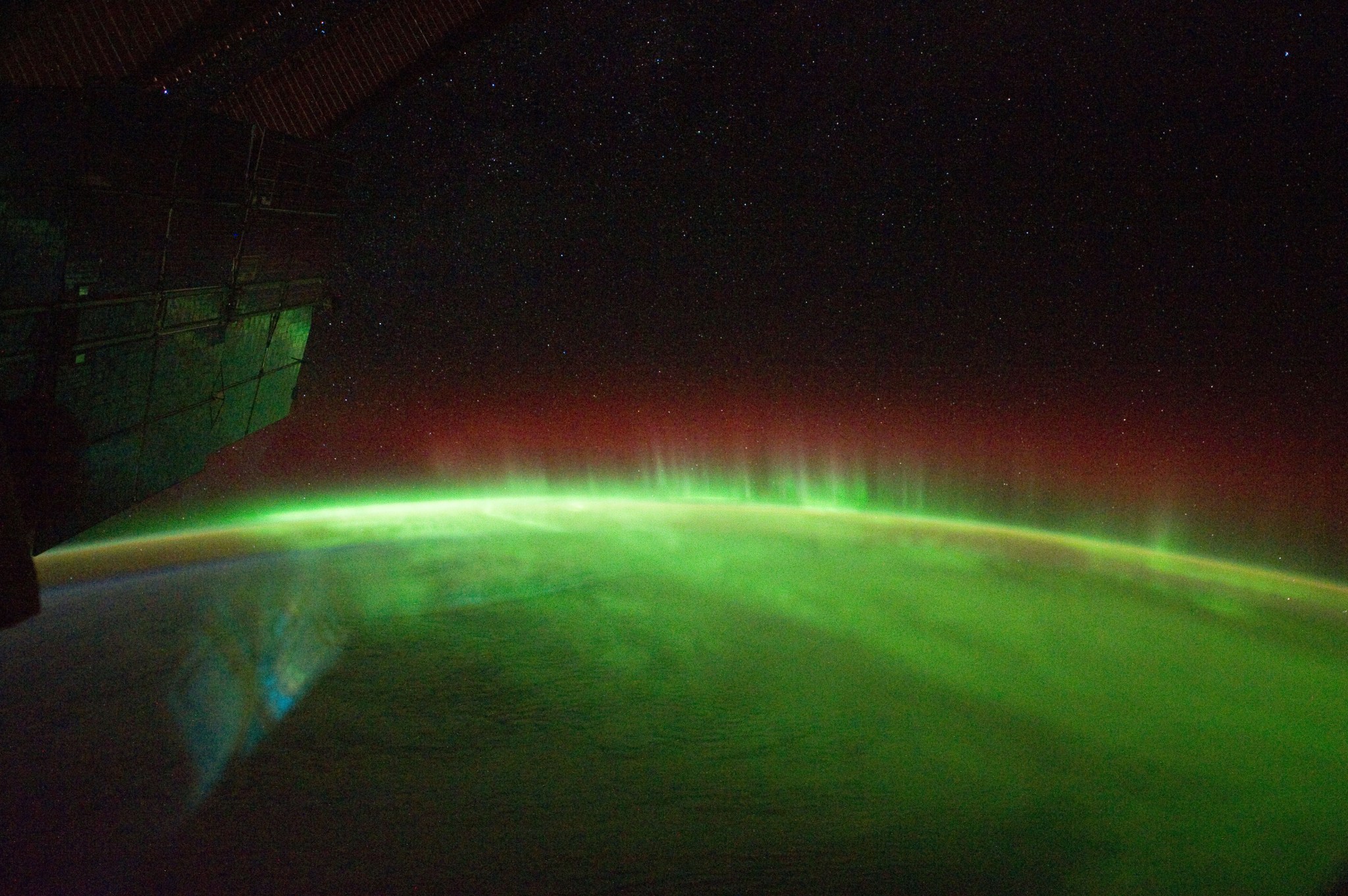 This is one of a series of night time images photographed by one of the Expedition 29 crew members from the International Space Station. It features Aurora Australis, airglow, southwest Tasman Sea. The light reflection is from inside the spacecraft. Nadir coordinates are 47.79 degrees south latitude and150.71 degrees east longitude.